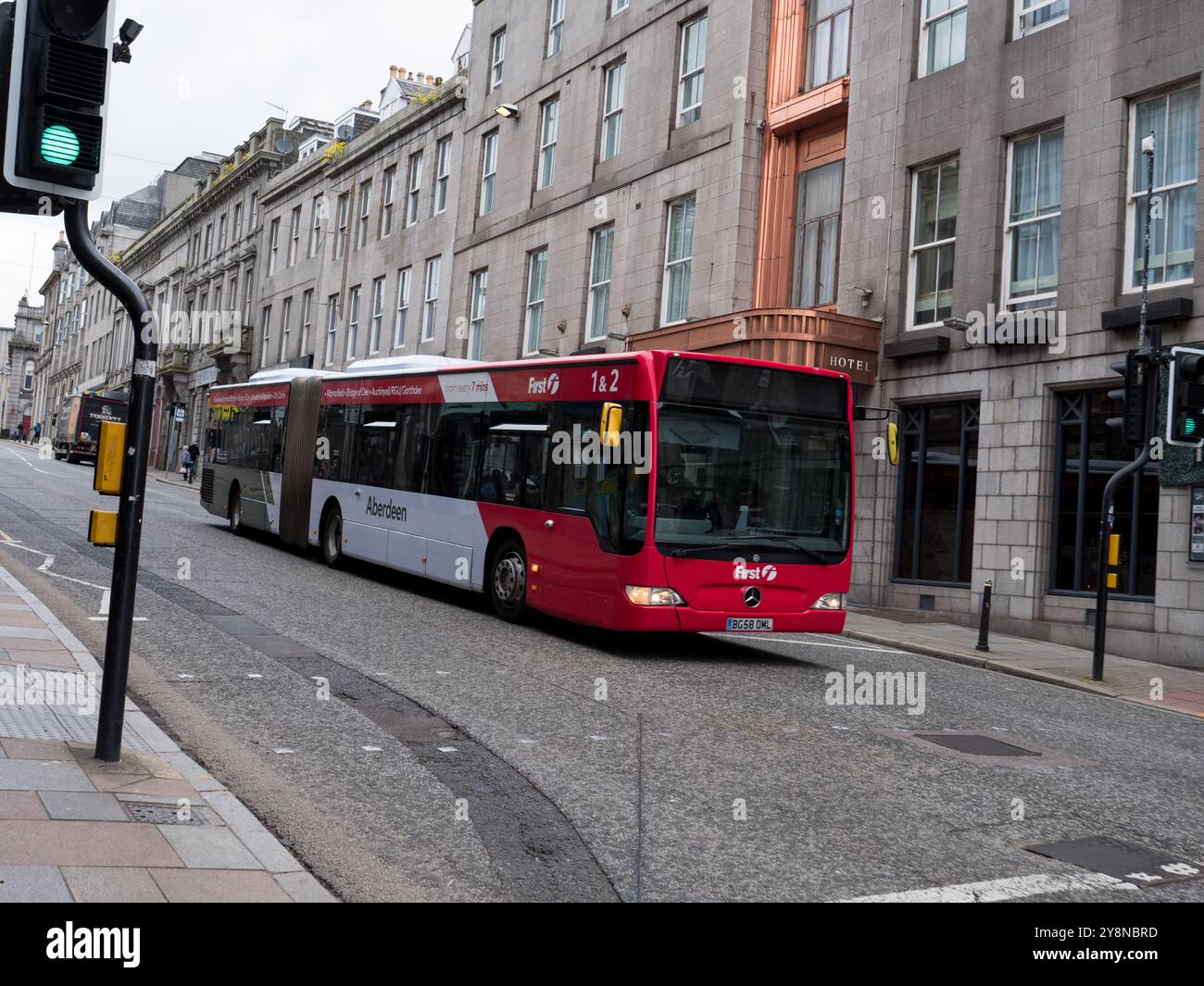 First Bus bendy bus in Aberdeen Stock Photo - Alamy