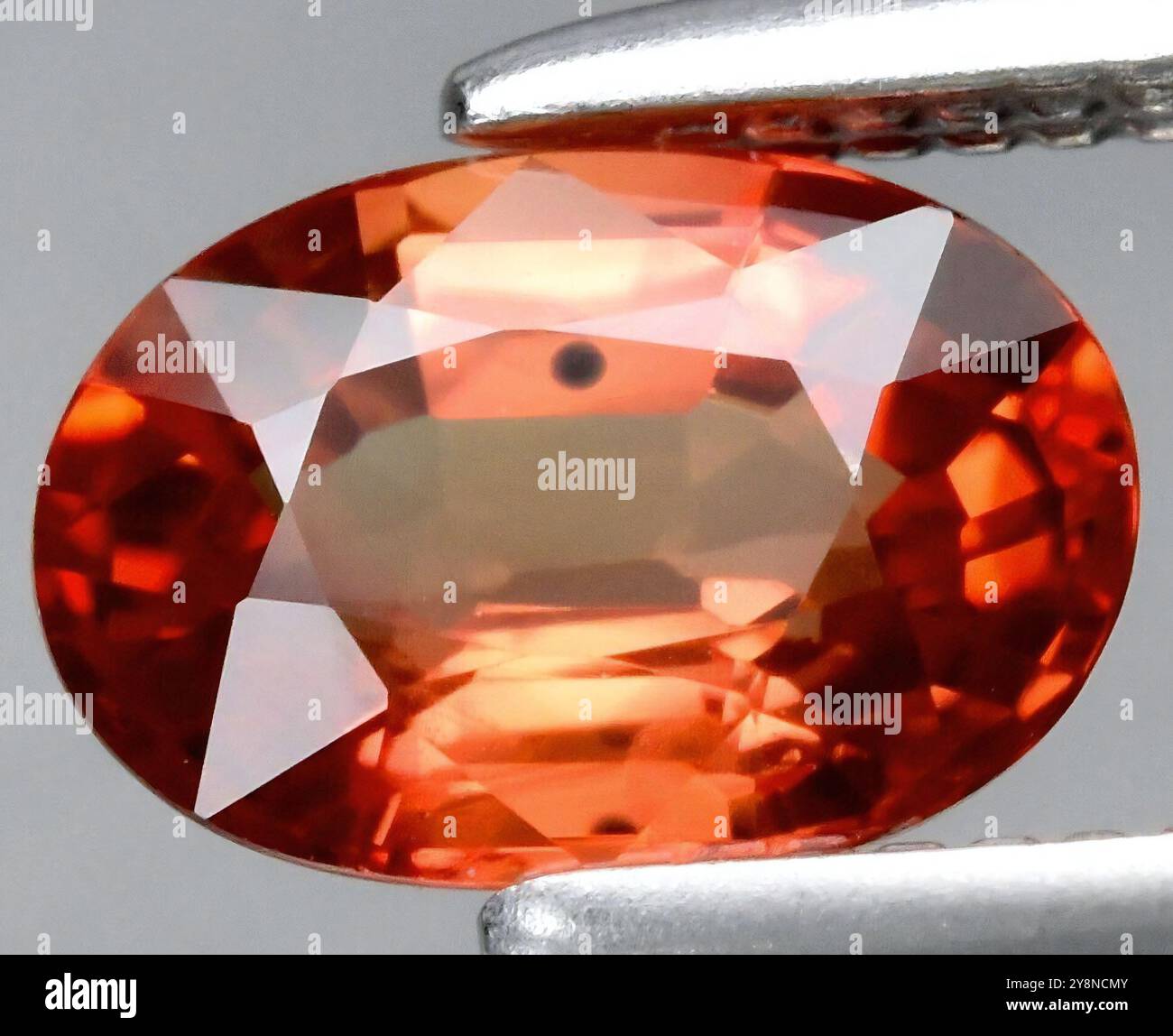 Stunning Fiery Orange Natural Gemstone with Intricate Faceting and ...