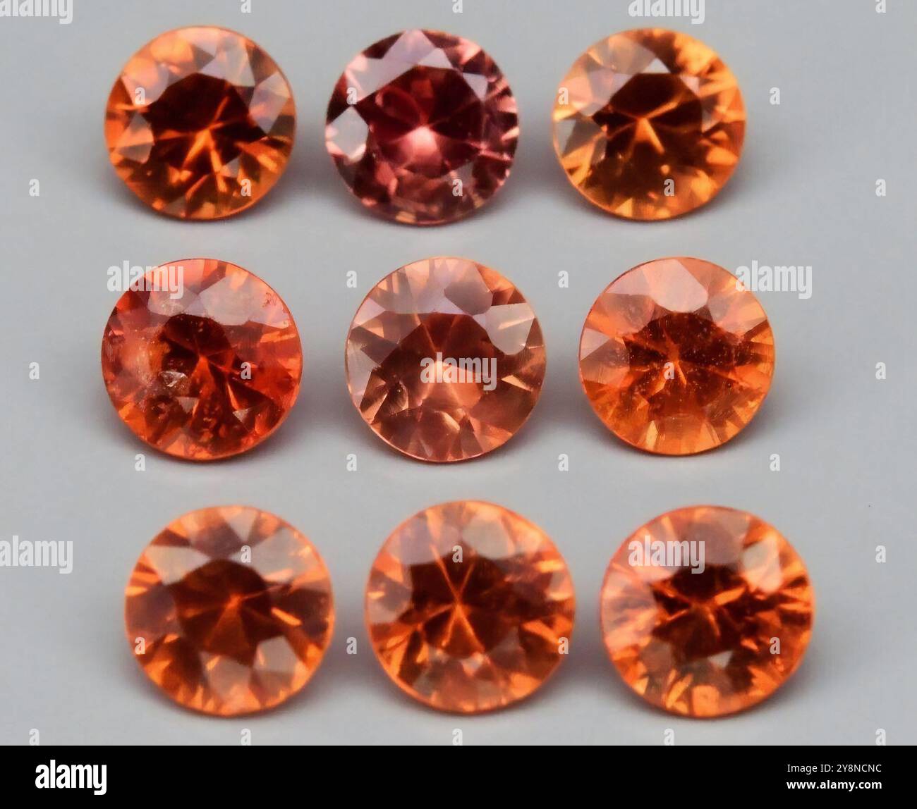 Exquisite Collection of Natural Orange Gemstones Displayed in a Unique ...