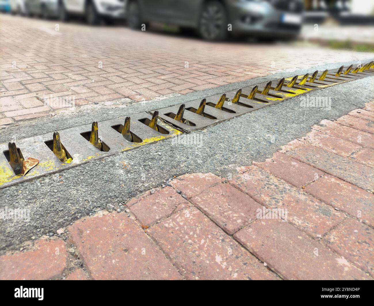Road Spike Barrier On The Street With One Way Traffic Stock Photo - Alamy