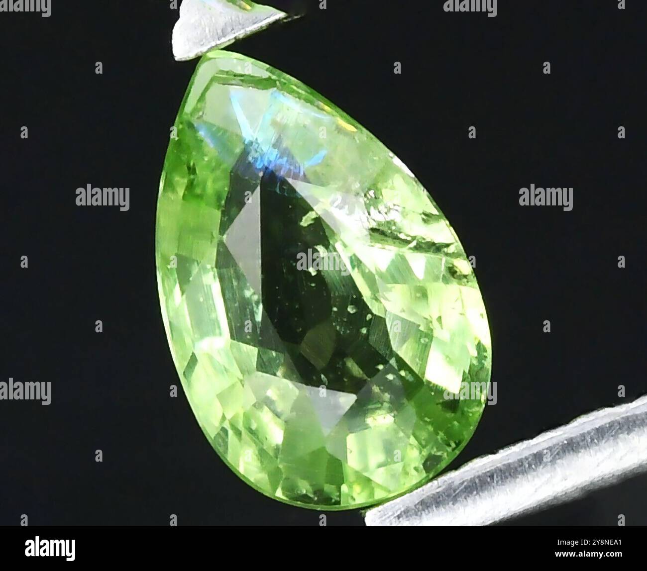 Exquisite Pear-Shaped Peridot Gemstone Showcasing Vibrant Green Hues ...