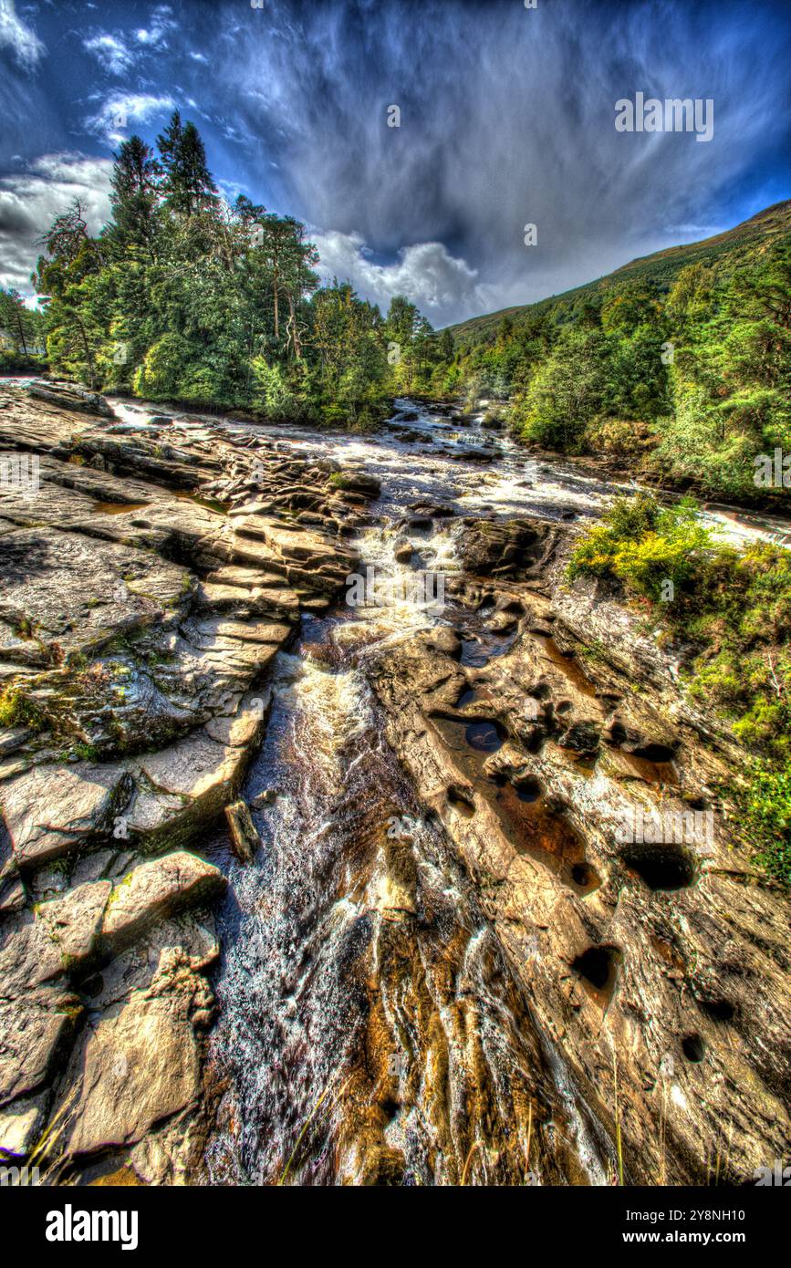 Village of Killin, Scotland. Artistic view of the River Dochart flowing ...