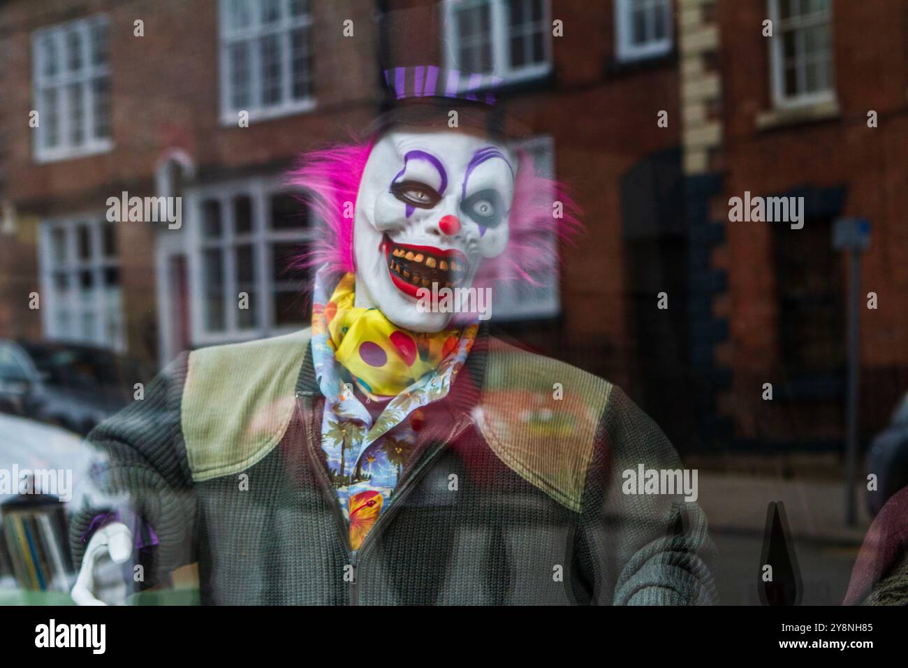 Step right up to the eerie charm of this shop window, where a creepy ...