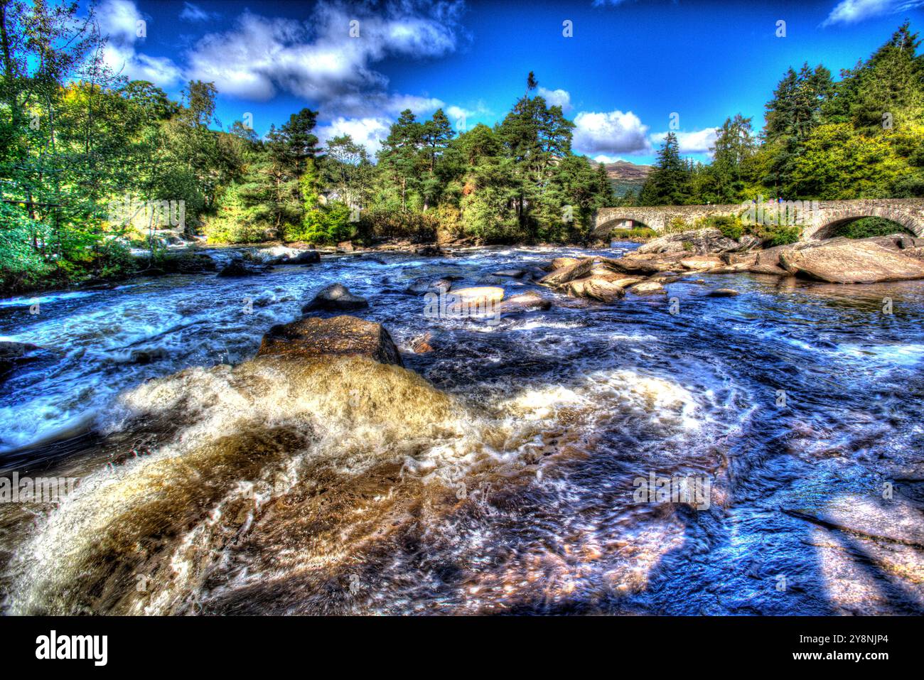 Village of Killin, Scotland. Artistic view of the Falls of Dochart with ...