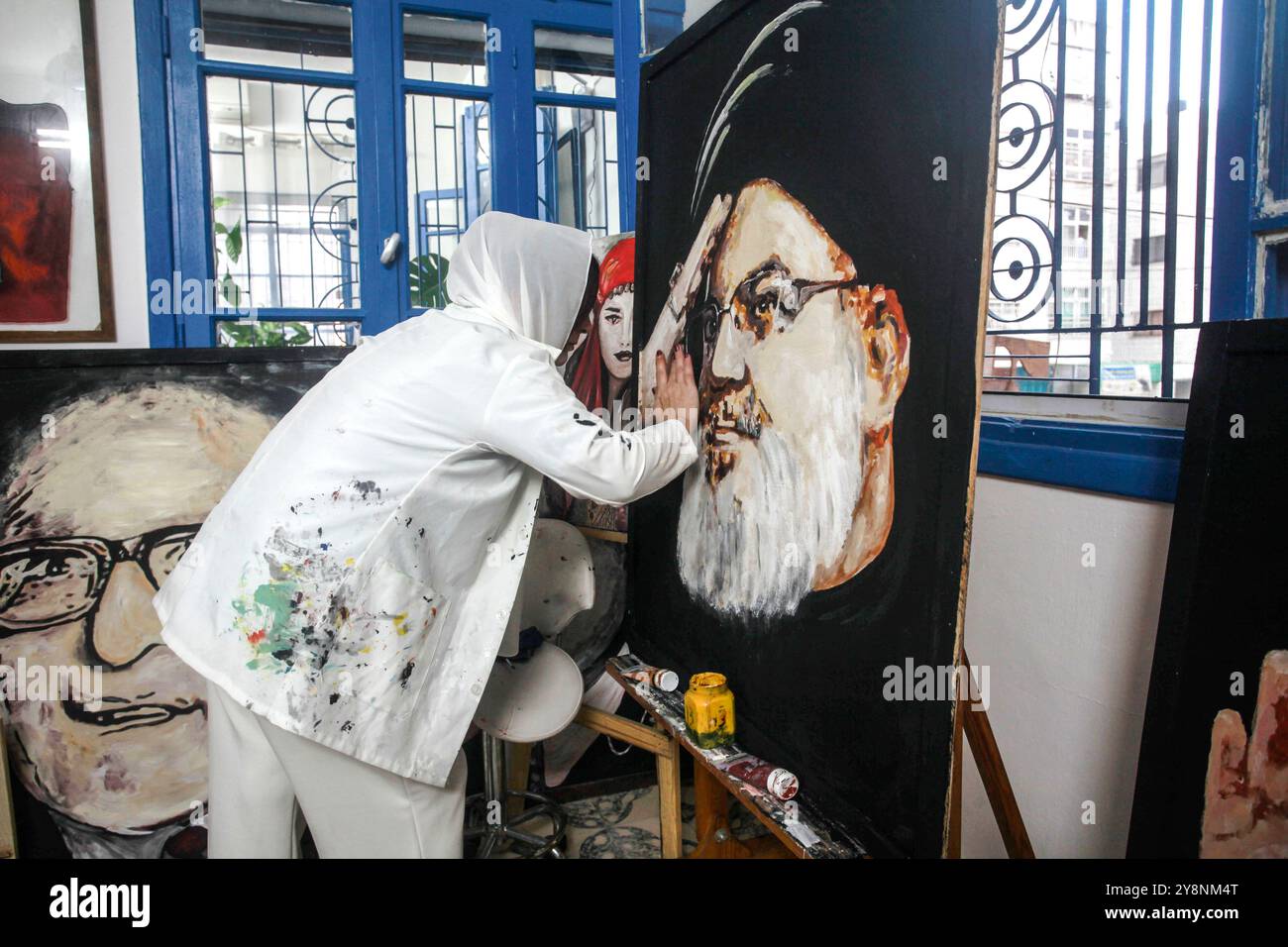 Nablus, West Bank, Palestine. 5th Oct, 2024. A Palestinian artist ...