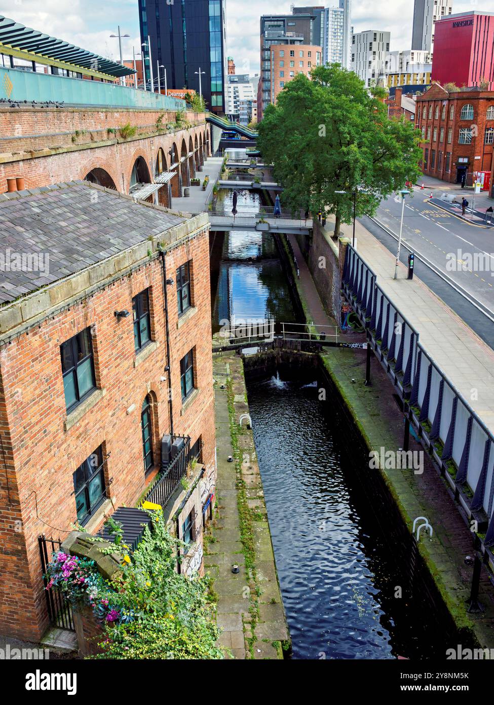 Manchester, UK. September, 28, 2024: Picturesque urban canal lined with ...