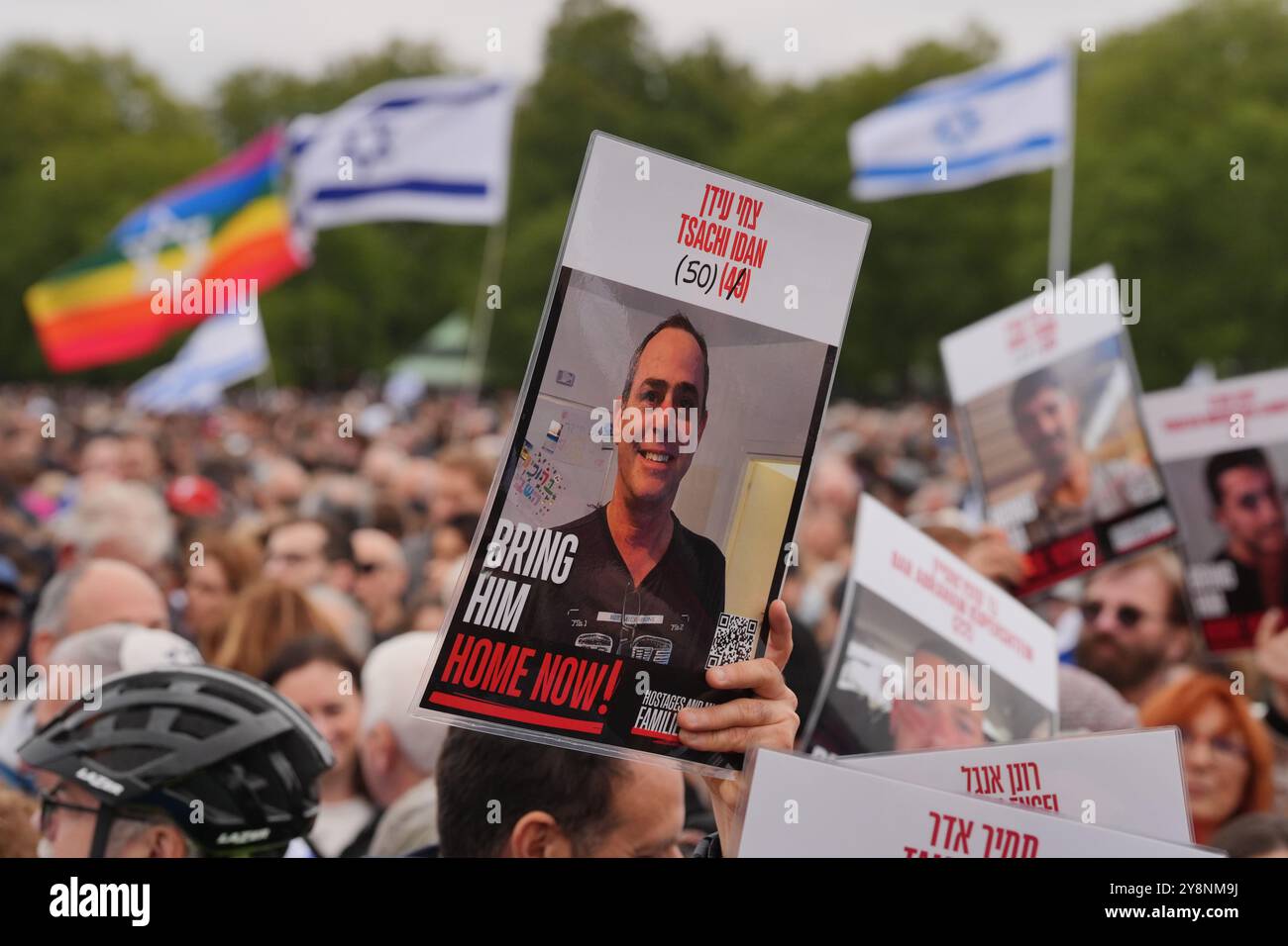People attending the Remembering October 7 memorial event in Hyde Park ...