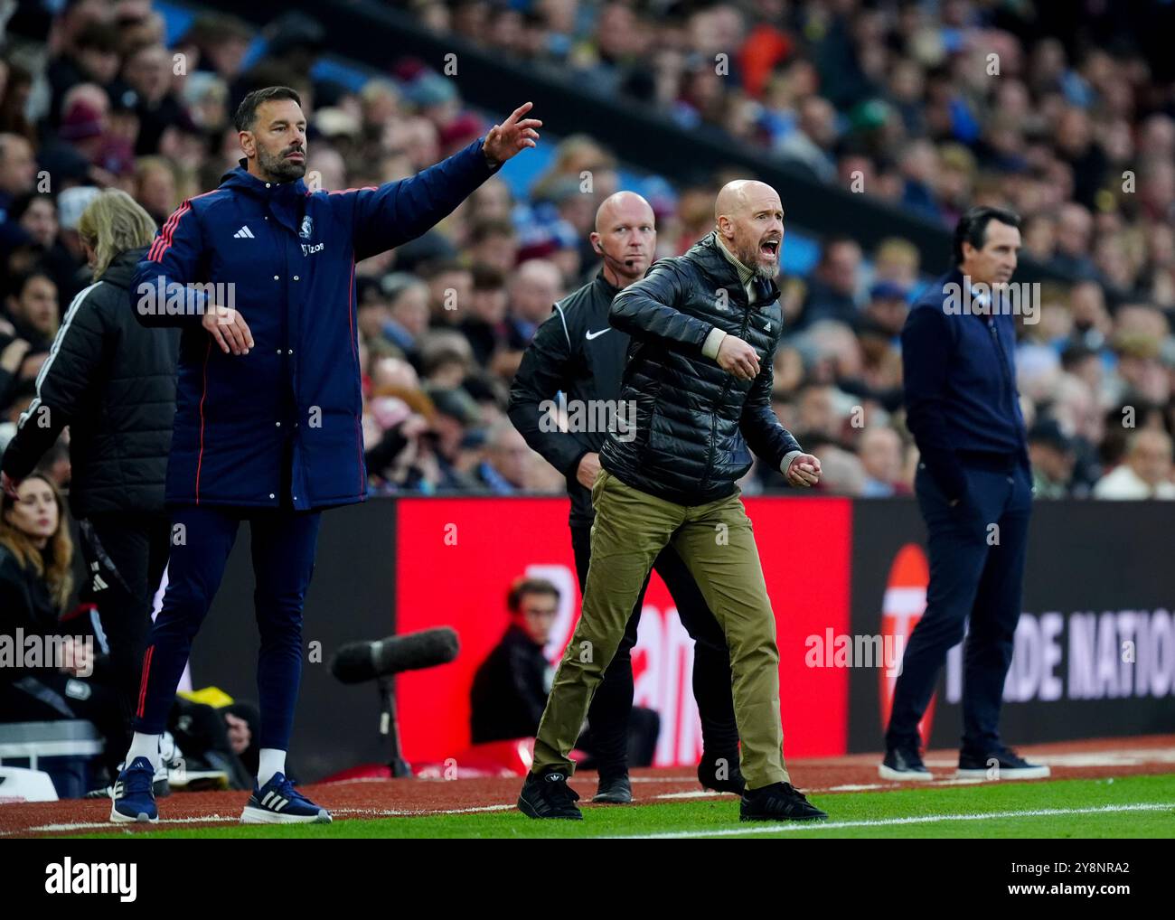 Manchester United assistant manager Ruud van Nistelrooy (left) and ...