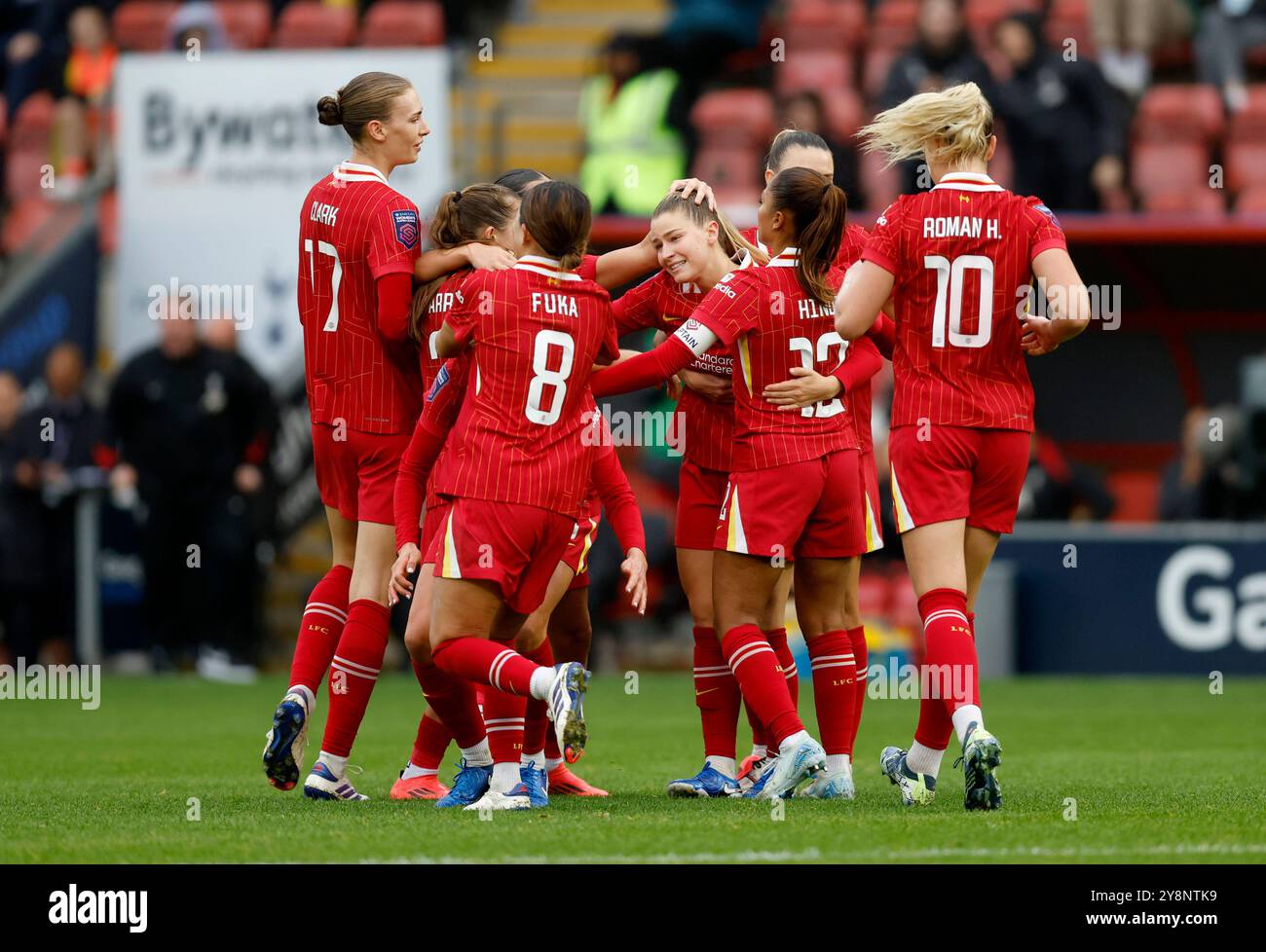 Liverpool's Marie Hobinger celebrates scoring their side's third goal ...