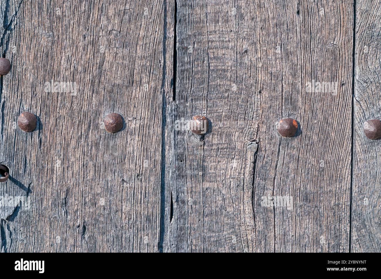 old wooden door with iron rivets Stock Photo - Alamy