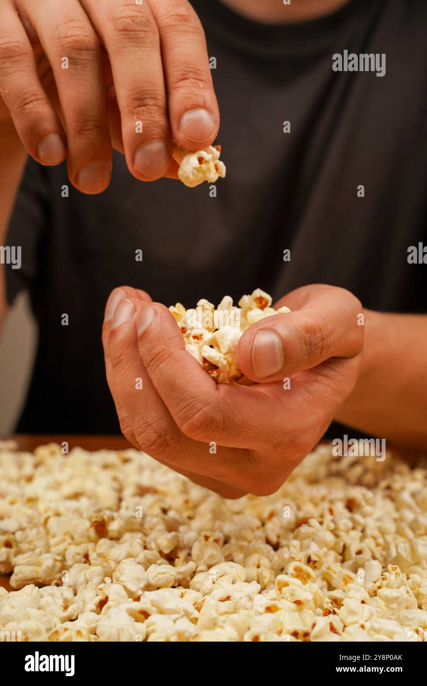 Delicious snack to eat in the cinema. Salted popcorn. Popcorn. Fast ...