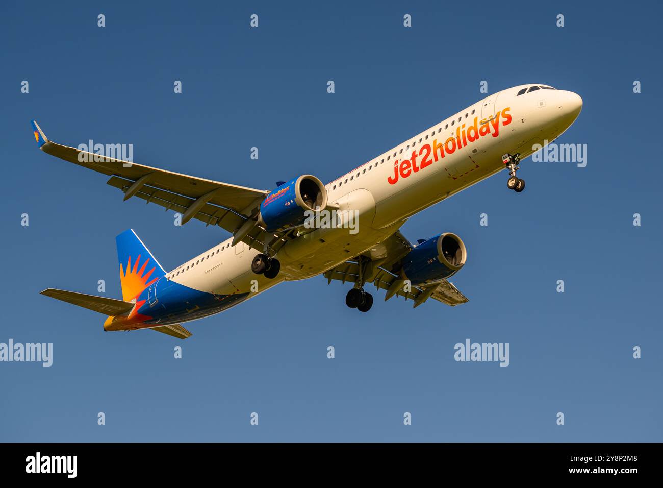 A Jet2 Holidays Airbus A321neo on final approach to runway 15 ...