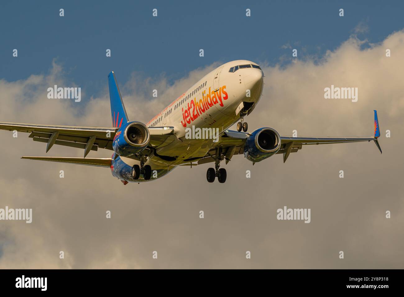 A Jet2 Holidays Boeing 737-800 on final approach to runway 15 ...