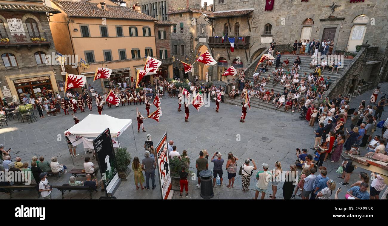Flag throwers in the main town square in Cortona, Italy. The Archidado ...