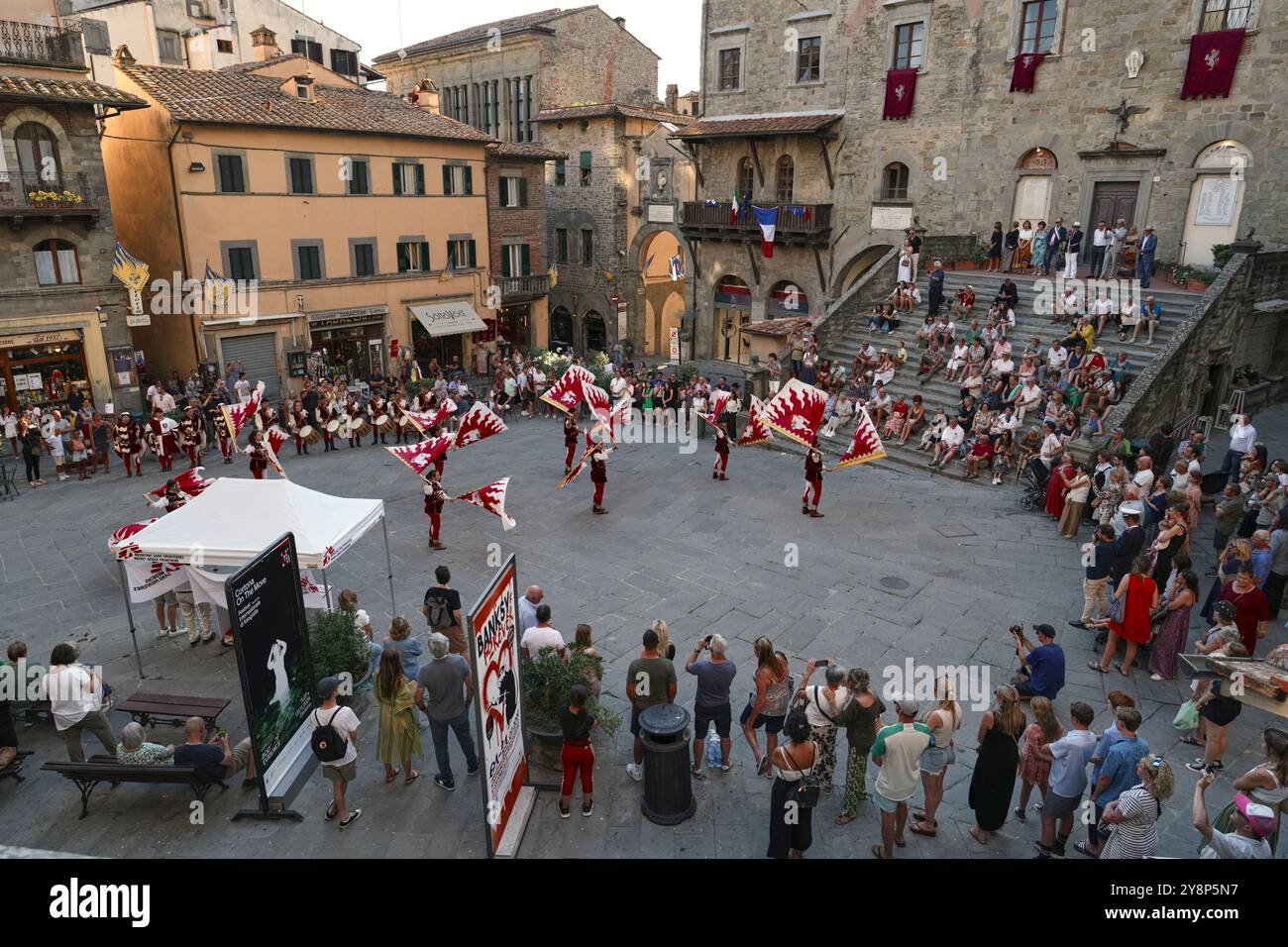 Flag throwers in the main town square in Cortona, Italy. The Archidado ...
