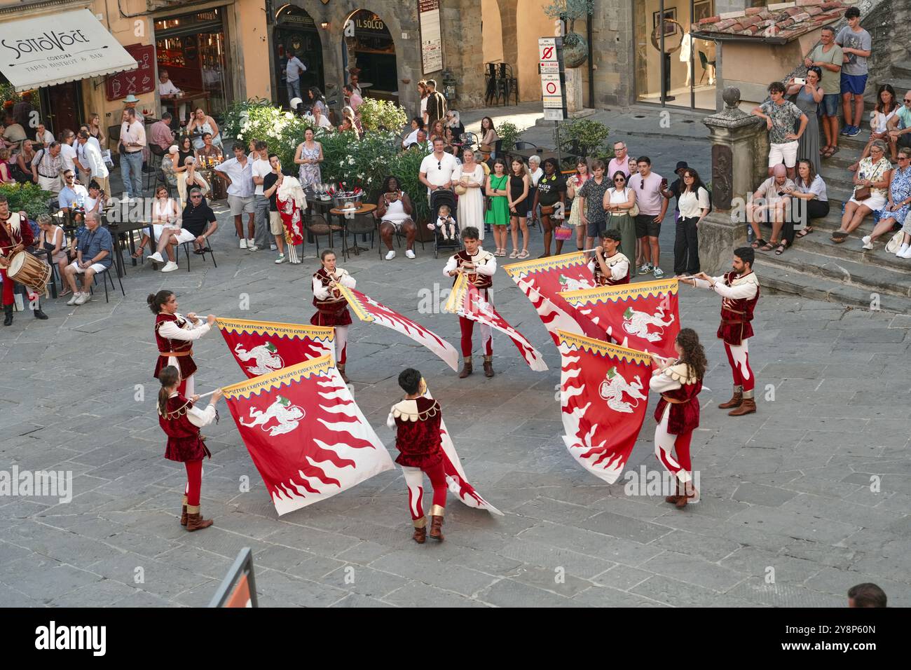 Flag throwers in the main town square in Cortona, Italy. The Archidado ...