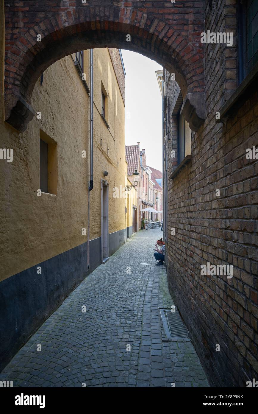 Phone call in the narrow street hi-res stock photography and images - Alamy