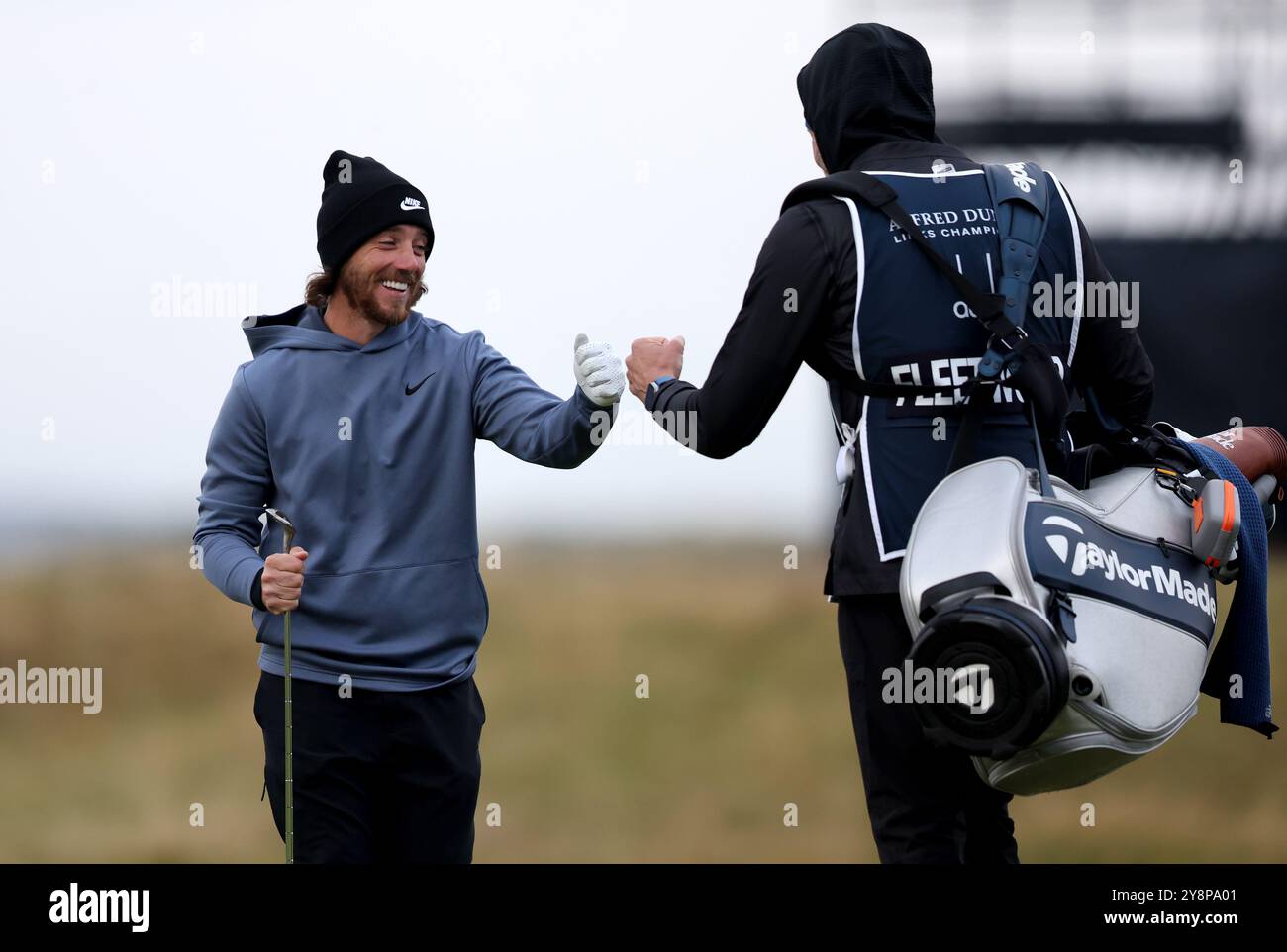 Tommy Fleetwood (left) with his caddie on the seventeenth green during ...