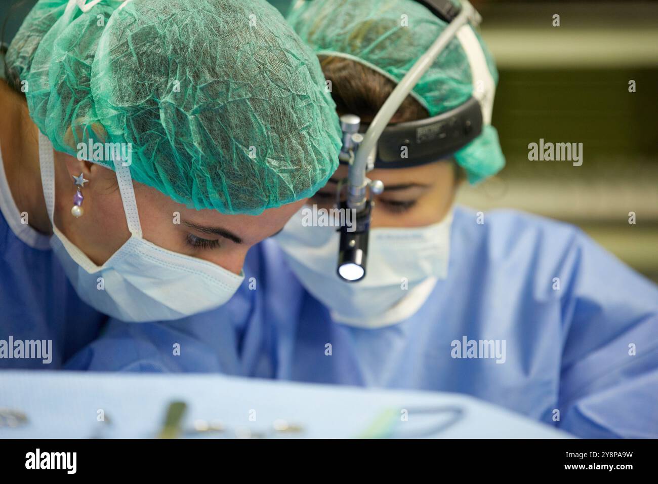 Tonsillectomy, Surgeons performing a tonsillectomy tonsil removal ...