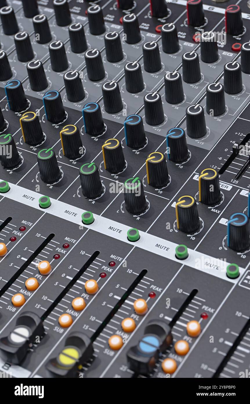 Sound engineer's console, music studio equipment. Close up shot ...