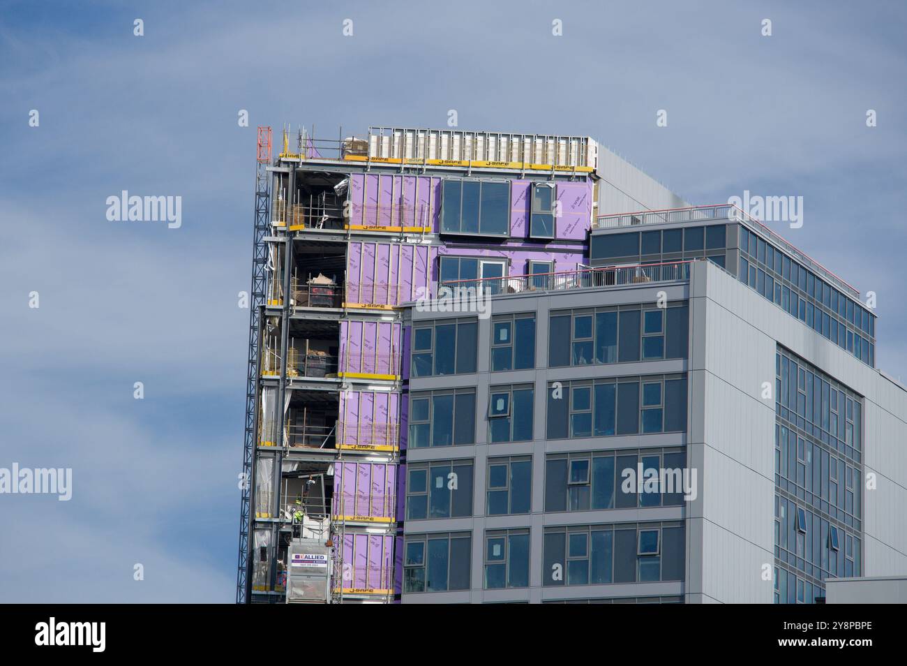 New high rise apartment under construction Stock Photo - Alamy