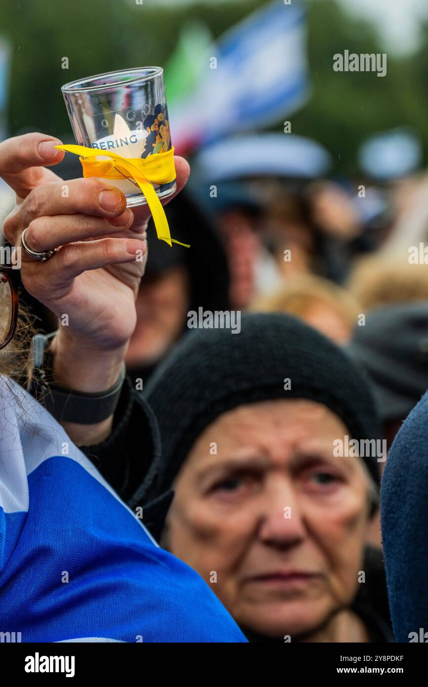 London, UK. 6th Oct, 2024. Candles are lit symbolically prior to a ...