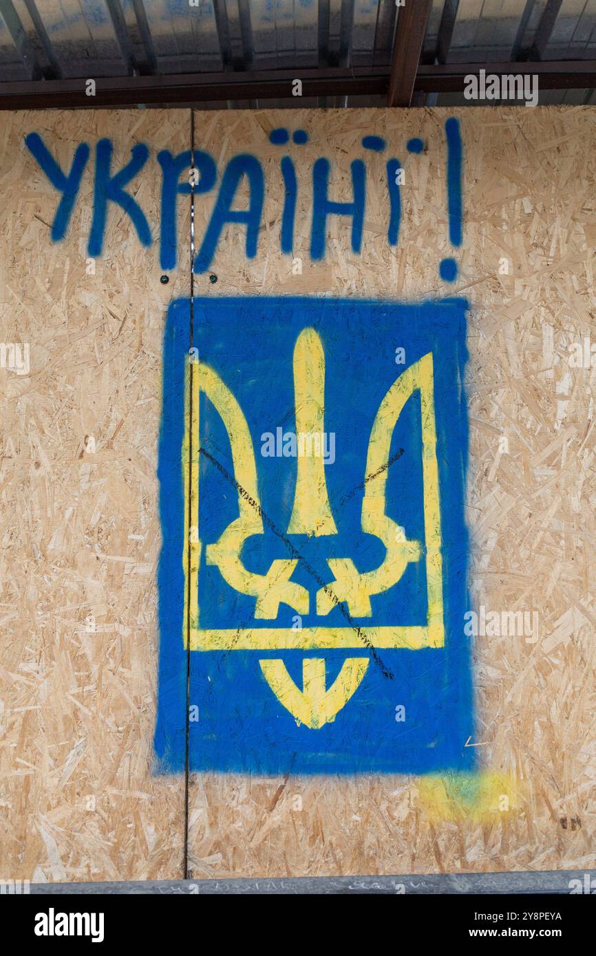Tbilisi, Georgia - 17 AUG 2024: Stencil sign of Ukraine on a chipboard ...