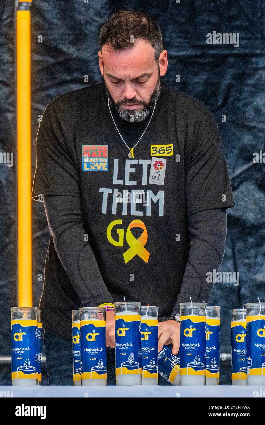 London, UK. 6 Oct 2024. Symbollic Candle lighting on stage ...