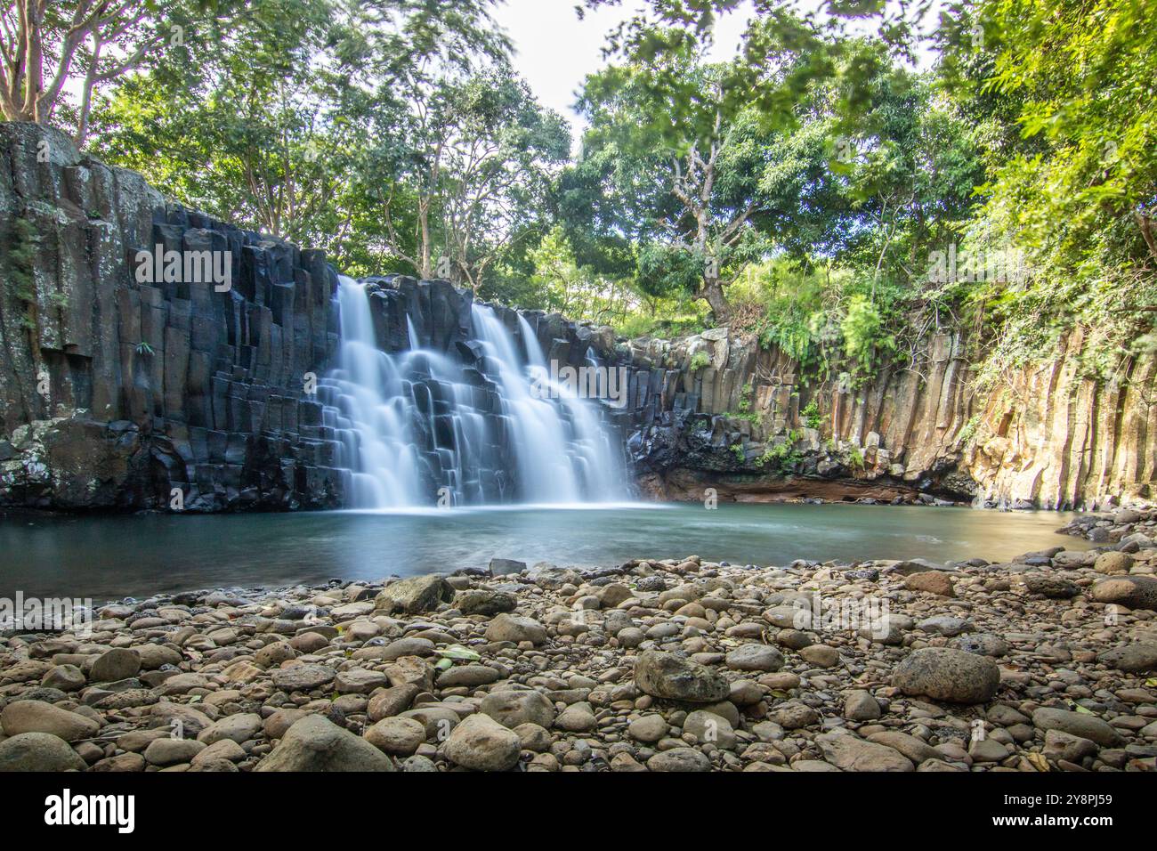 The waterfall is a 10 m high waterfall that cascades over basal steles ...