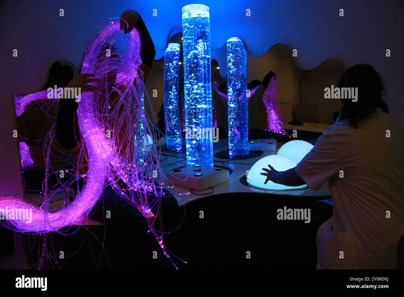 Snoezelen space with a patient and a nurse in a mental health facility ...