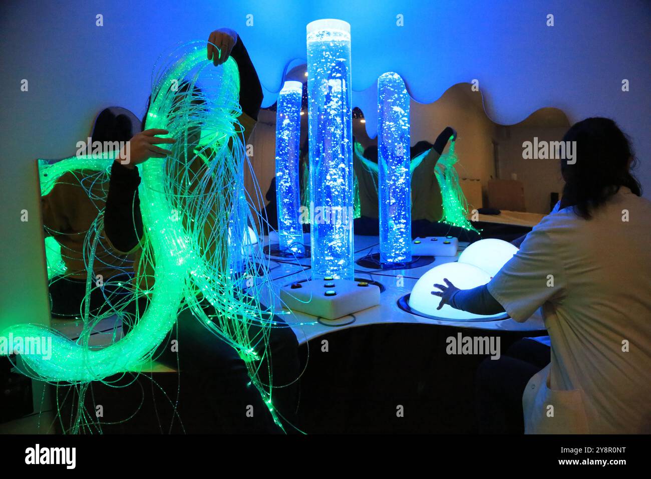 Snoezelen space with a patient and a nurse in a mental health facility ...