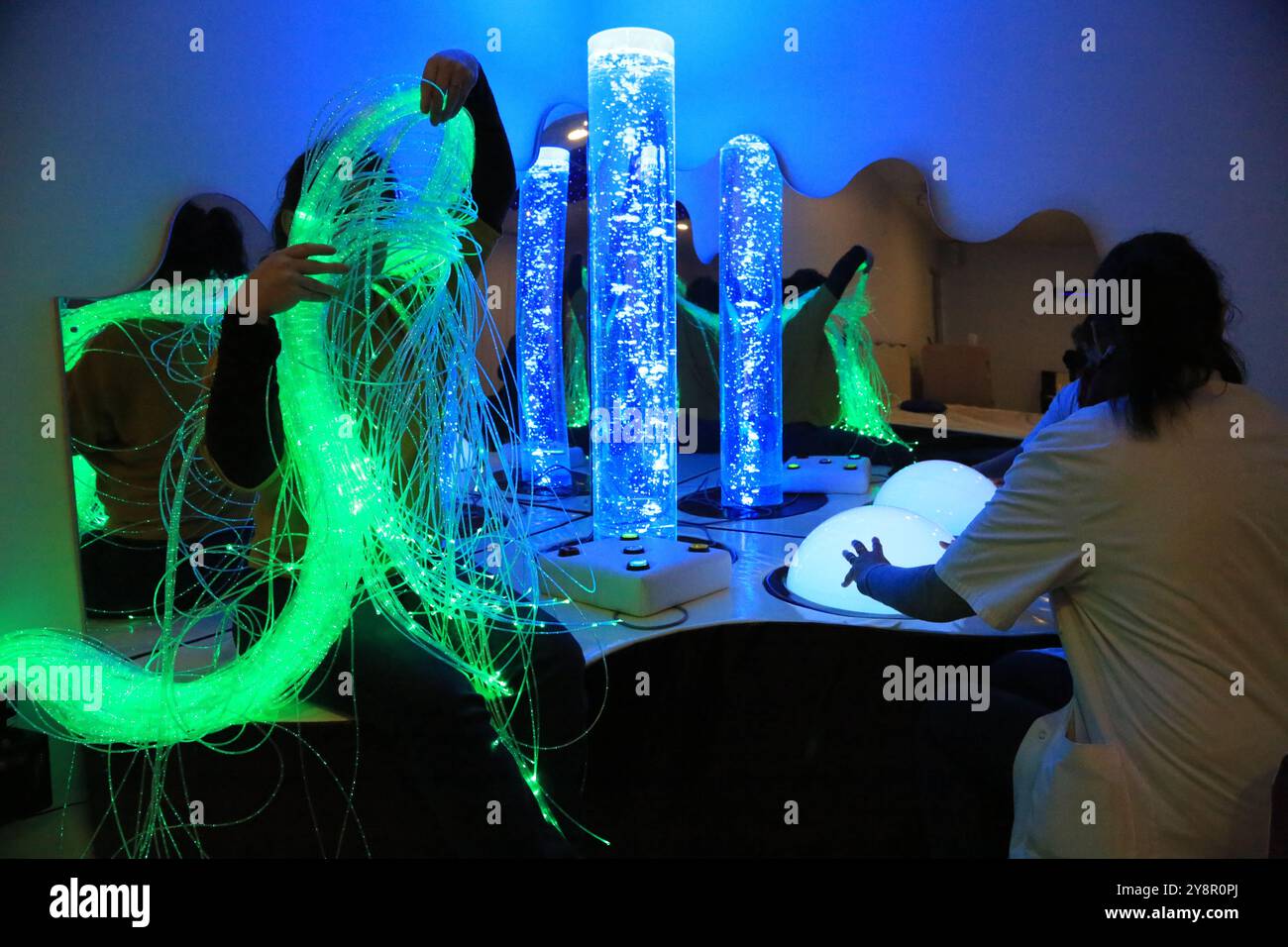 Snoezelen space with a patient and a nurse in a mental health facility ...