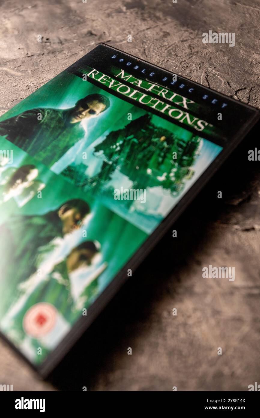 Third in the series Matrix Revolutions on DVD with a very green and ...