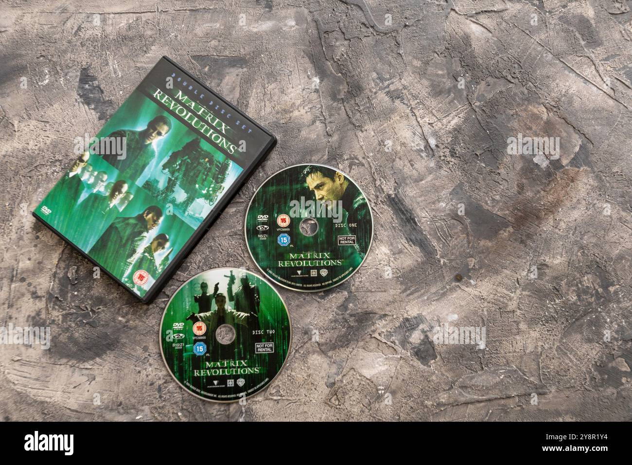 Third in the series Matrix Revolutions on DVD with a very green and ...