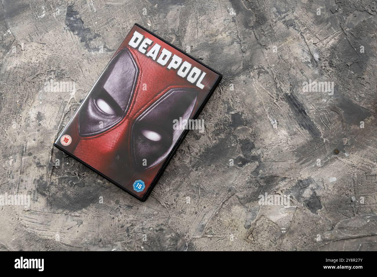 American superhero film Deadpool on DVD showing the red and black ...