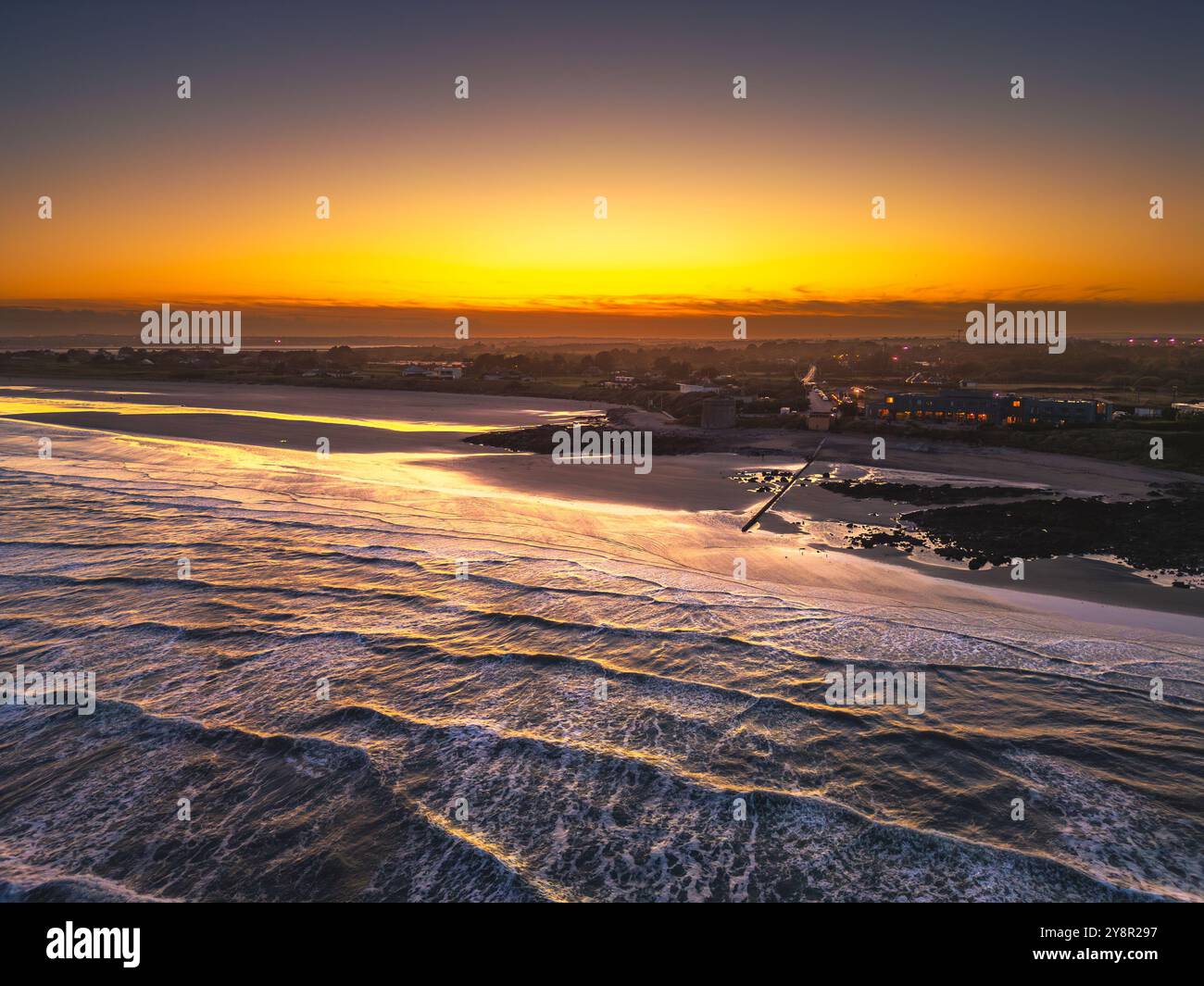 Dusk over Balcarrick Beach Stock Photo - Alamy