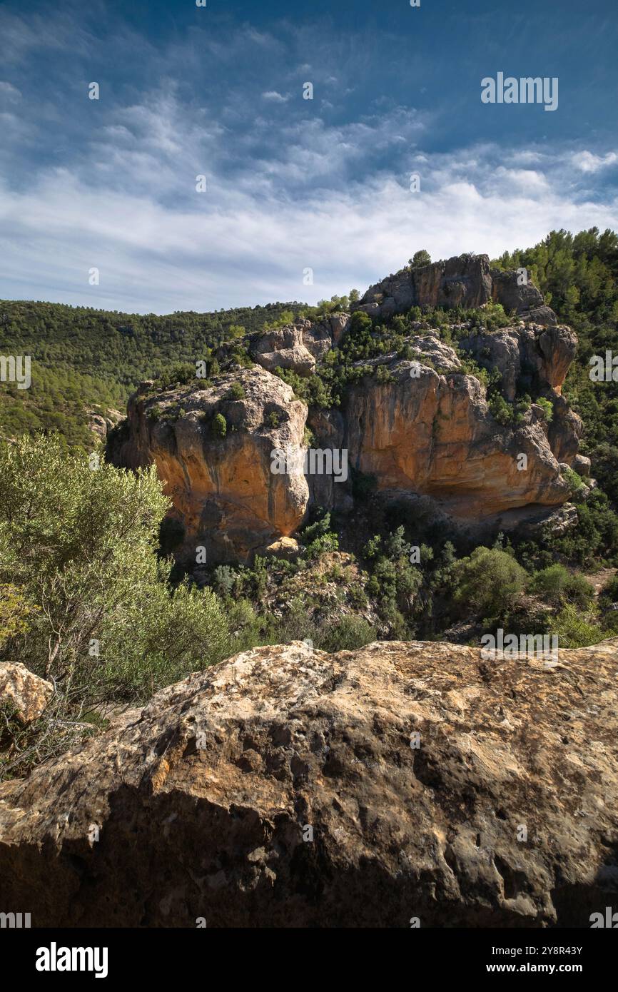 landscape of Rocky Cliffside Path Overlooking Lush Green Valley with ...