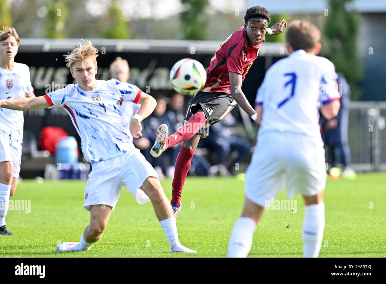 Ravn Loe (4) of Norway pictured defending on Precious Ogbeiwi (19) of Belgium during a friendly ...