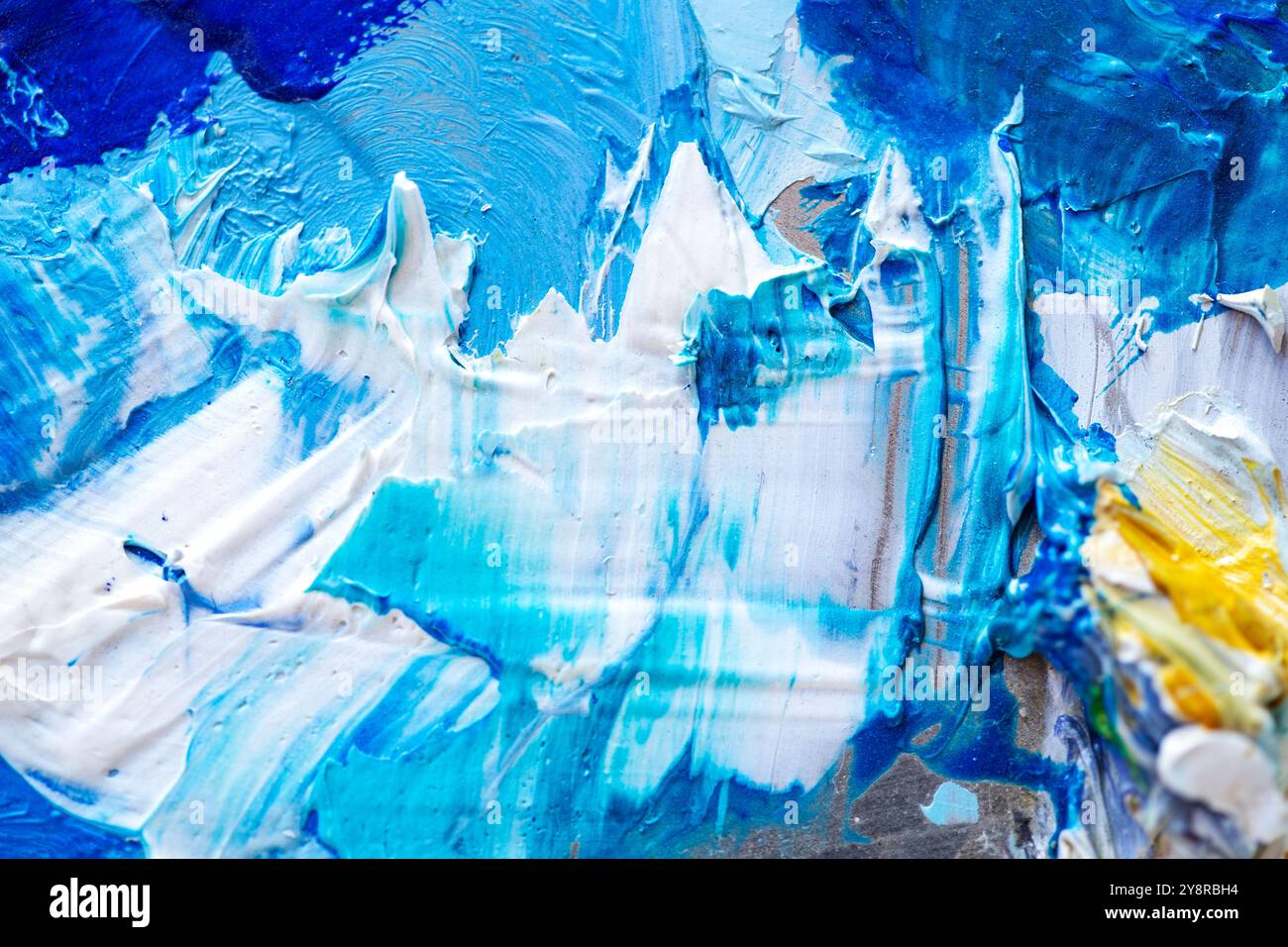 Blue and white oil color spots on a painting palette Stock Photo - Alamy