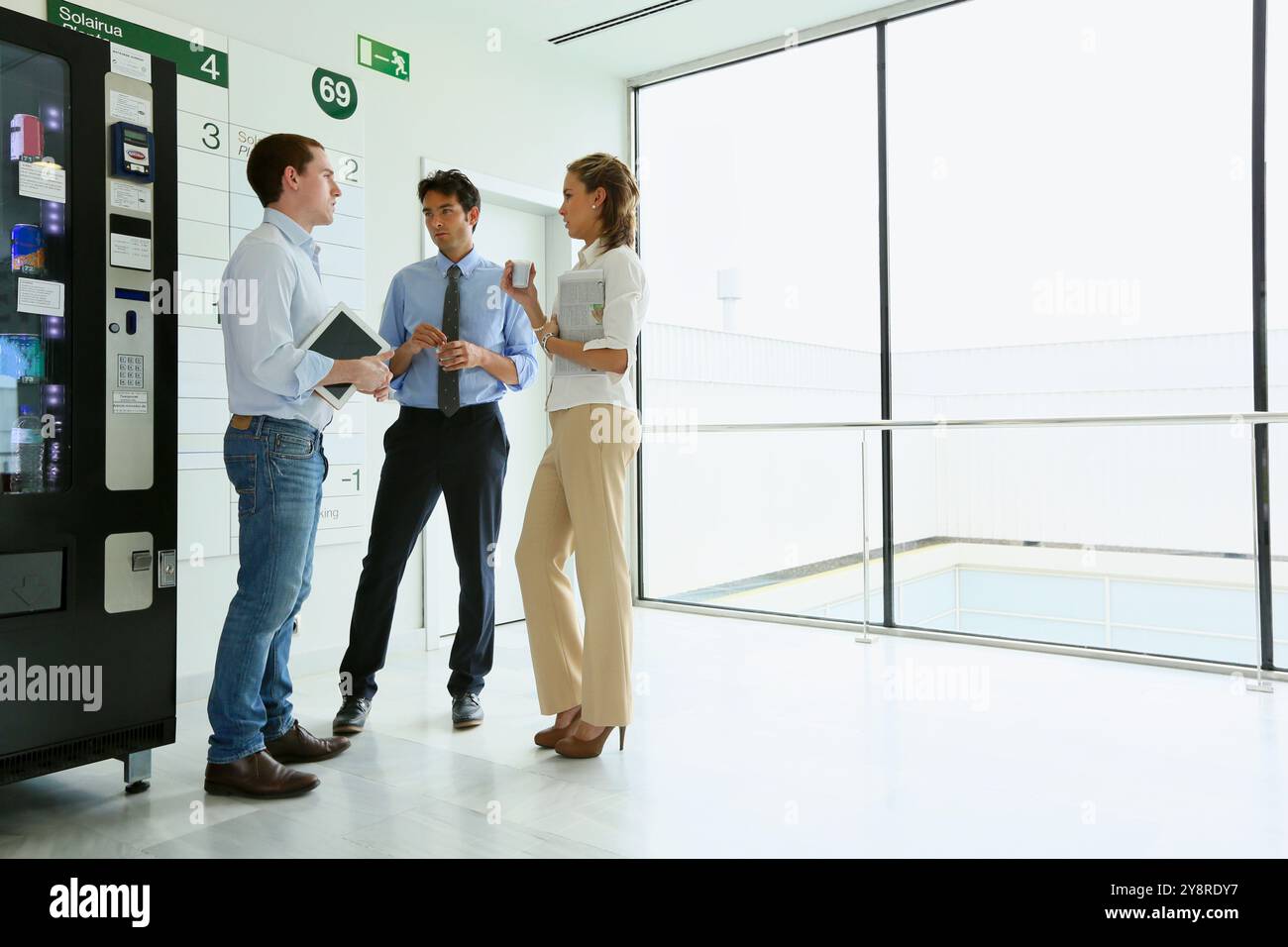 Office workers taking a break Stock Photo - Alamy