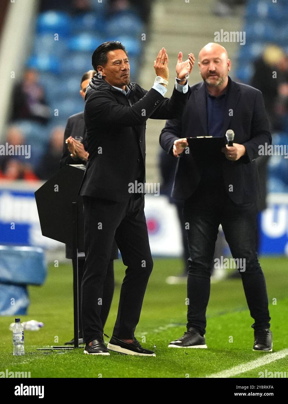 Former Rangers player Michael Mols acknowledged the crowd at half time ...