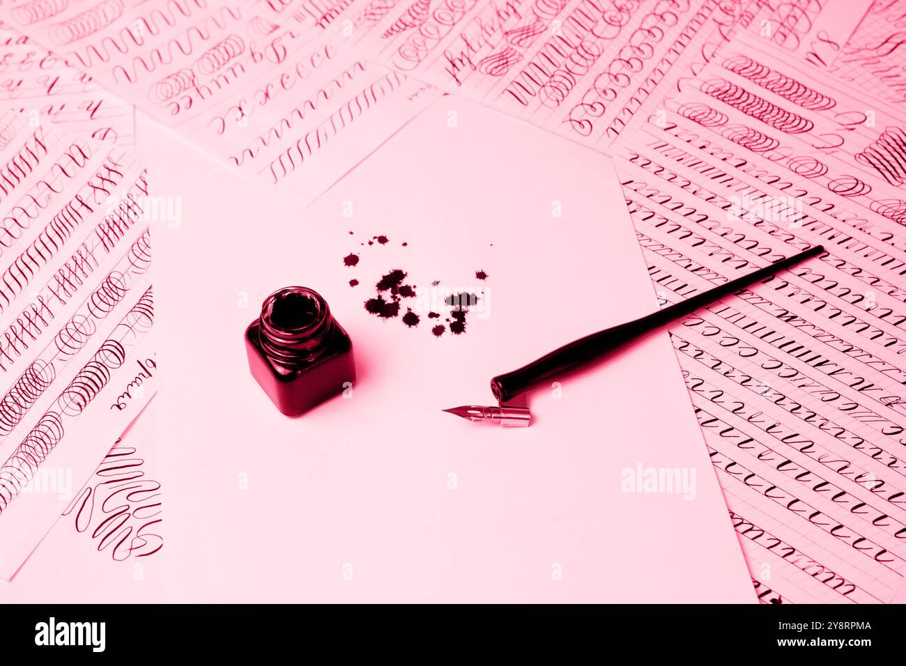ink bottle with metal tips for ink pen on a white background ...