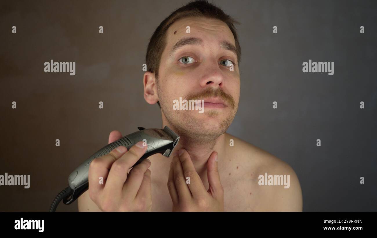 face shaving electric razor. cut facial stubble by shaver. stubble man ...
