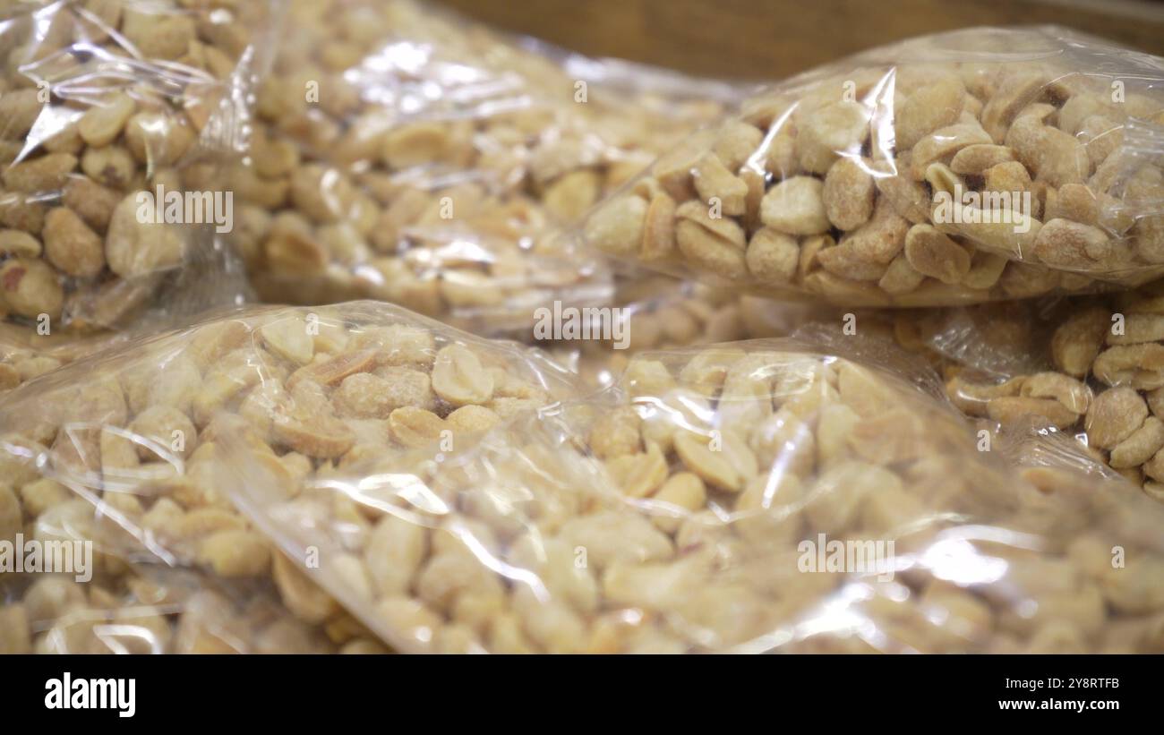 Arachis inside packaged plastic in a grocery store. Packaging from ...