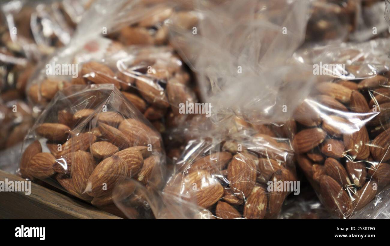 Arachis inside packaged plastic in a grocery store. Packaging from ...