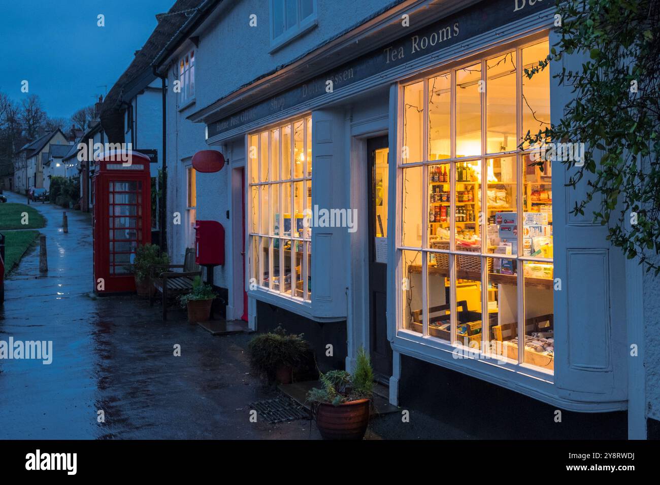 The village shop and post office on a wet evening in Hoxne Suffolk ...