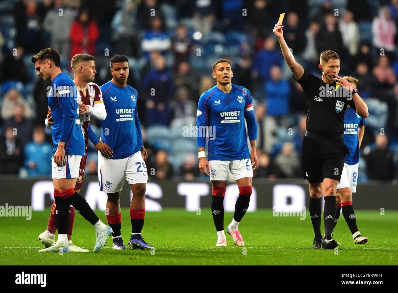 Rangers' Ianis Hagi (left) is shown a red card by referee David ...