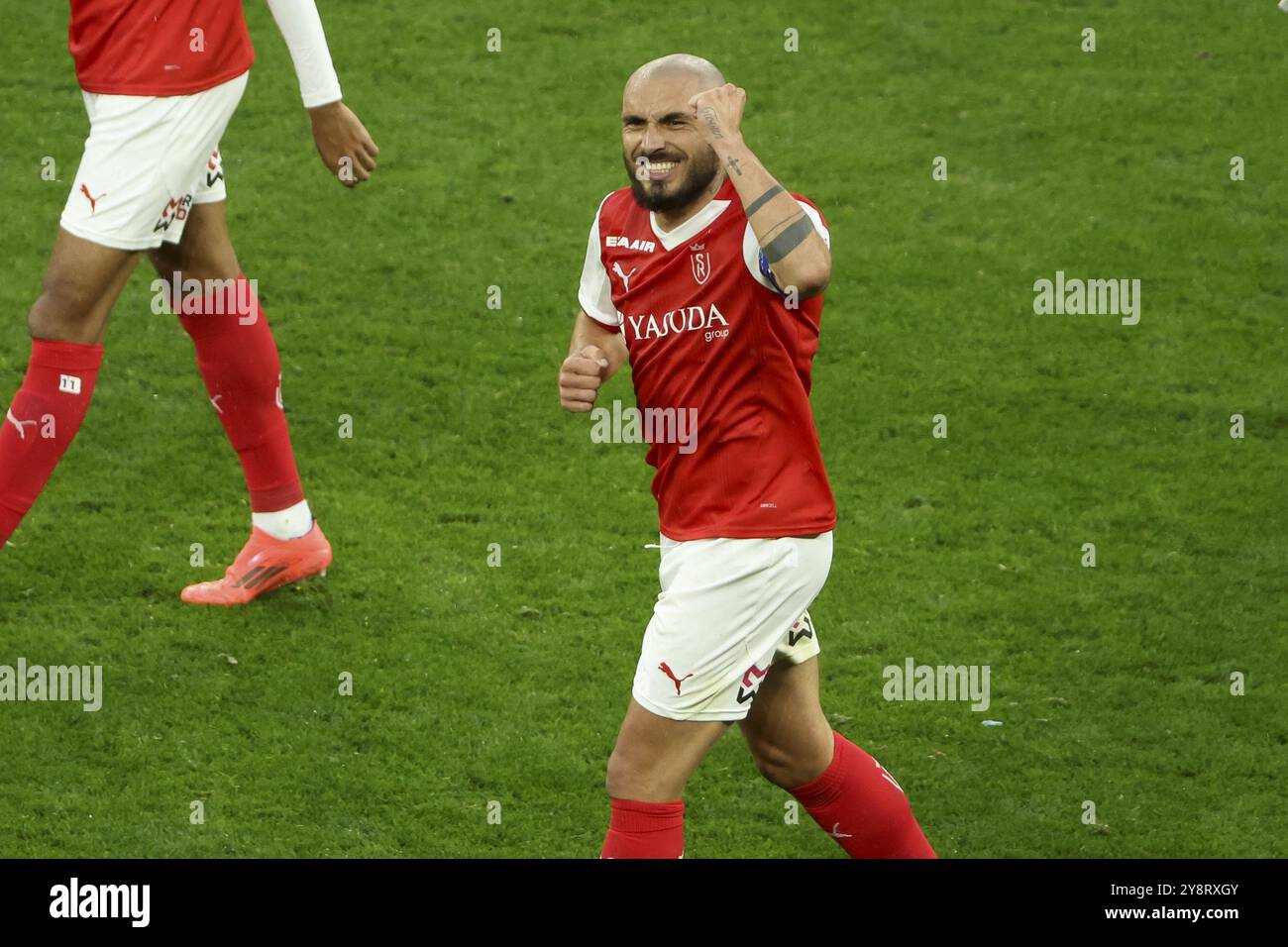 Teddy Teuma of Reims celebrates his goal during the French championship ...