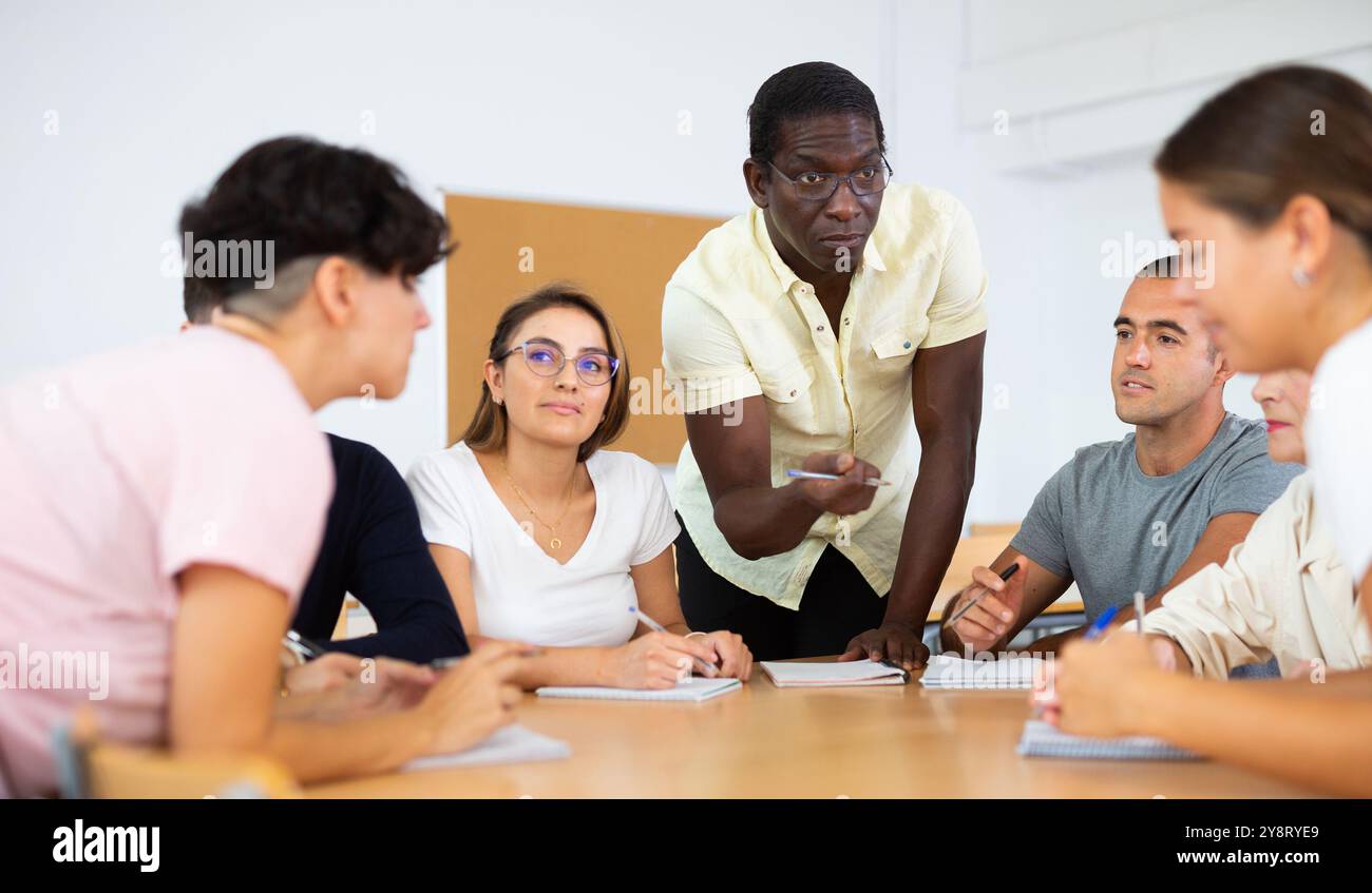 Conversation on diverse language communication hi-res stock photography ...