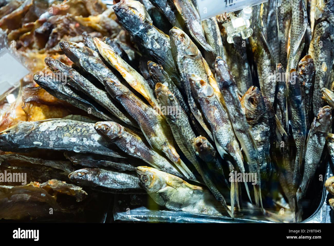 Dried salted fish in market showcase Stock Photo - Alamy